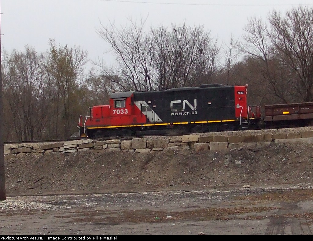 CN 7033